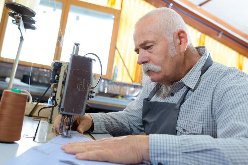 Senior Using Sewing Machine in Factory Stock Image - Image of mechanic ...