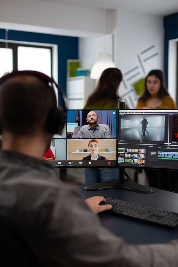 Senior Video Editor Director Talking with Creative Team in Web Online ...