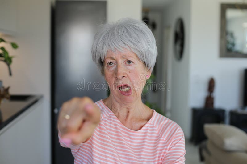 Senior Woman Accusing Someone of Doing Something Wrong with Hand ...