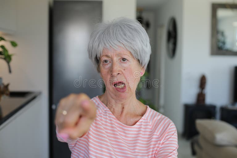 Senior Woman Accusing Someone of Doing Something Wrong with Hand ...