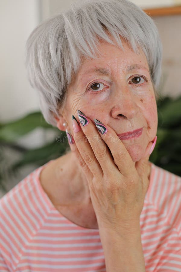 Senior Woman with Artsy Multicolored Long Nails Stock Image - Image of ...
