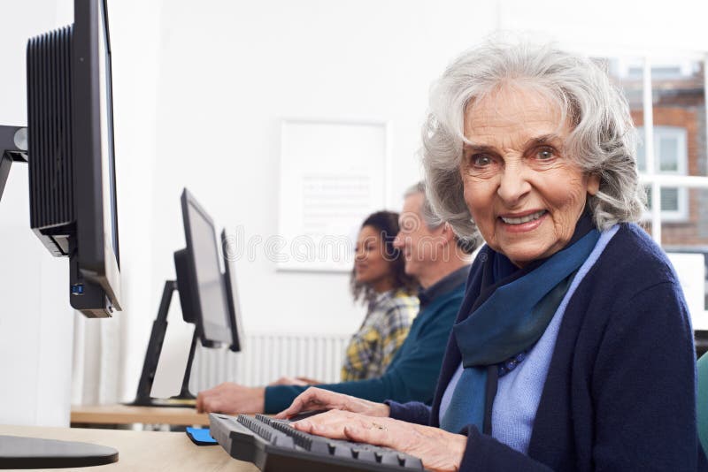 Senior Woman Attending Computer Class Stock Photo - Image of happy ...