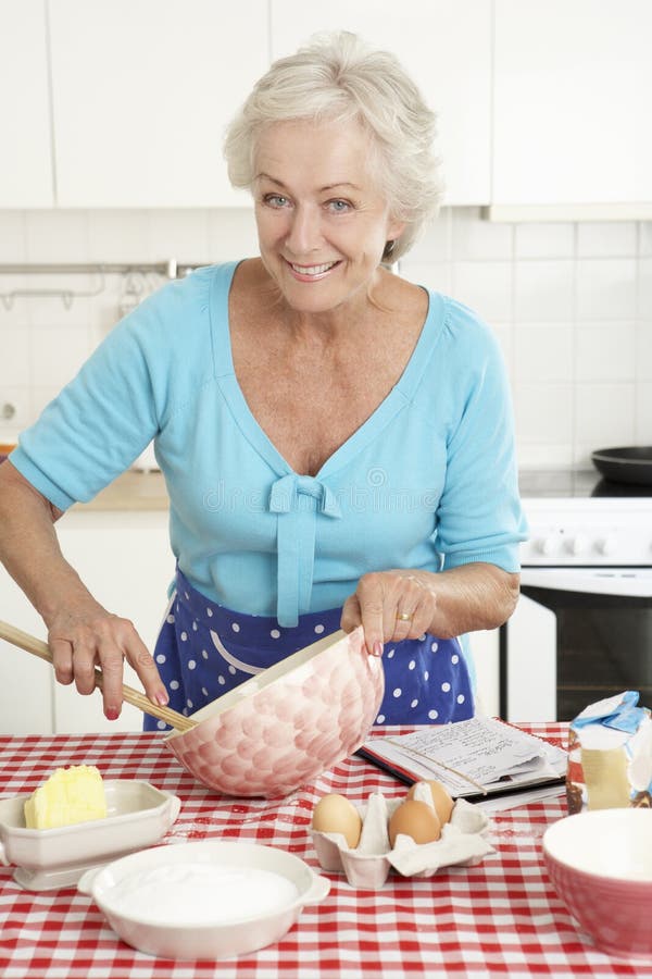 Senior Woman Baking in Kitchen Stock Image - Image of caucasian, baker ...