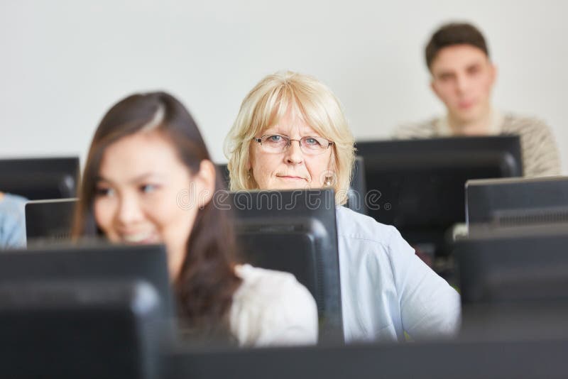 Senior Woman in Computer Course Stock Photo - Image of university ...