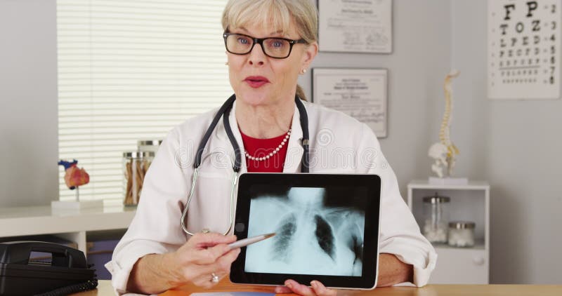 Senior Woman Doctor Talking X-ray Stock Video - Video of hospital ...