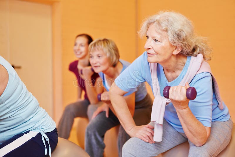 Senior Woman Doing Back Exercises Stock Photo - Image of body, lift ...