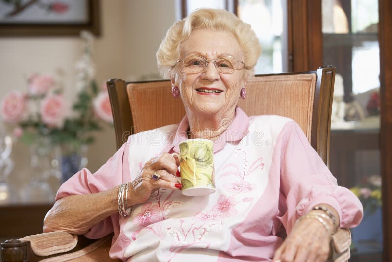Senior Woman Drinking Hot Beverage Stock Photo - Image of retirement ...