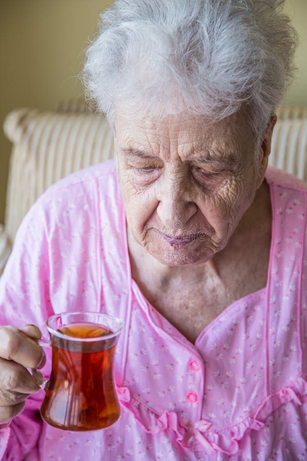 Senior woman drinking tea stock photo. Image of lifestyle - 43463034