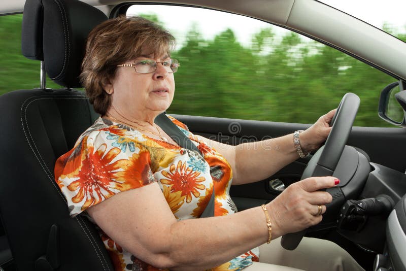 Senior Woman Driving a Car stock image. Image of lady - 31648613