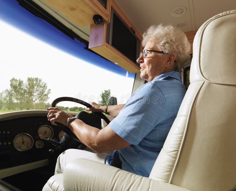Senior woman driving RV. stock photo. Image of retirement - 3187948