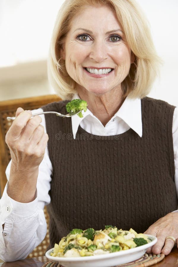Senior Woman Eating a Healthy Meal Stock Image - Image of lunch ...