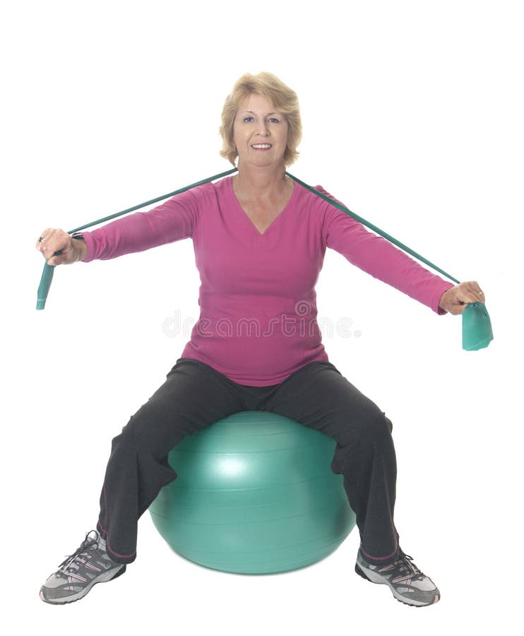 Senior Woman on Exercise Ball with Resistance Band Stock Image - Image ...