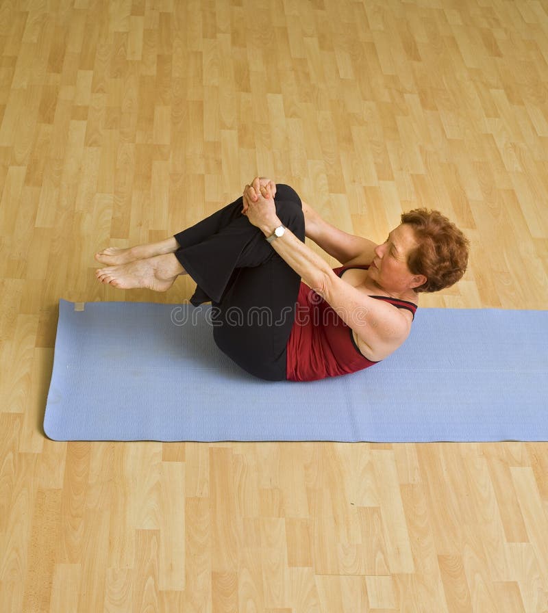 Senior Woman Exercising Yoga Stock Photo - Image of body, beauty: 8973836