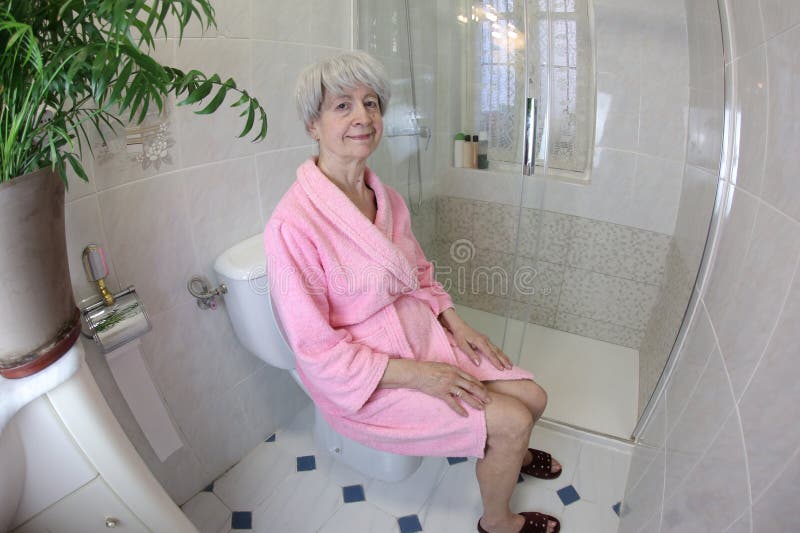 Senior Woman Feeling Constipated in the Bathroom Stock Image - Image of ...