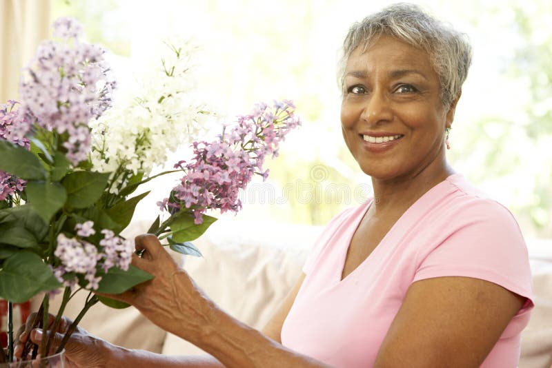 Senior Woman Flower Arranging at Home Stock Image - Image of ...