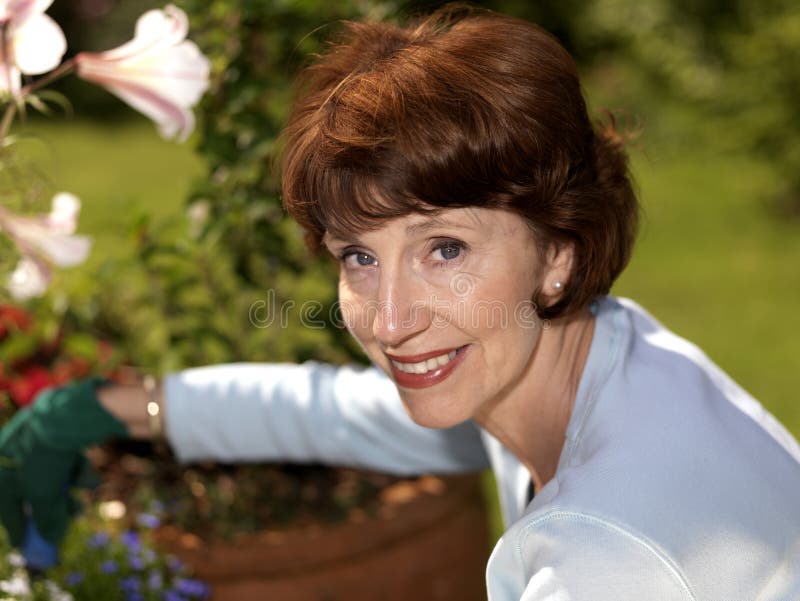 Senior woman gardening stock photo. Image of active, beautiful - 14028918