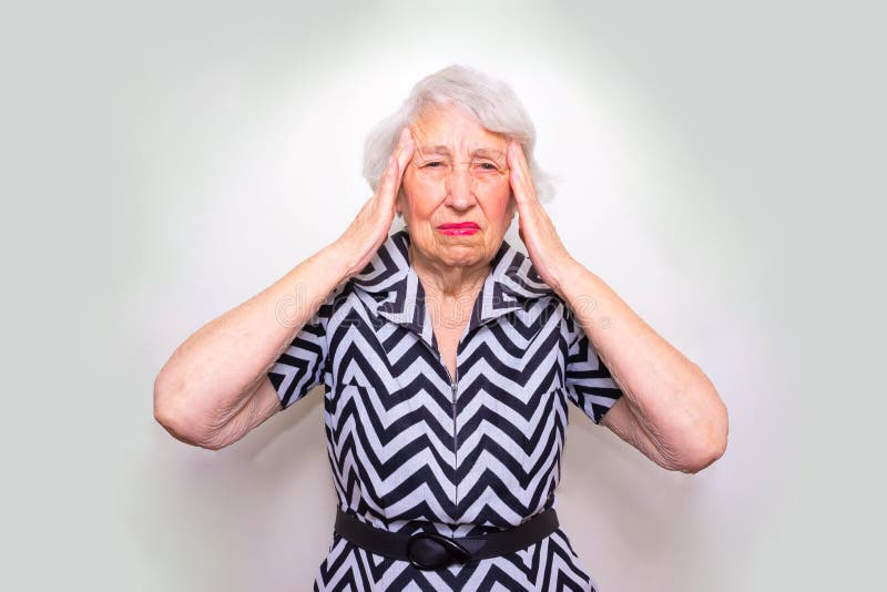Senior Woman with Head in Hands Looking Weary Stock Photo - Image of ...