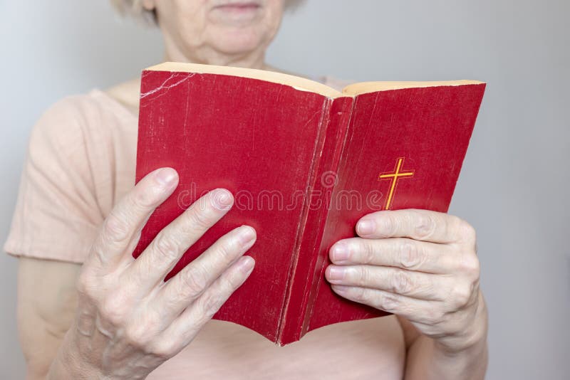 Senior Woman Holding An Old Holy Bible In Hands Elder Woman Holding