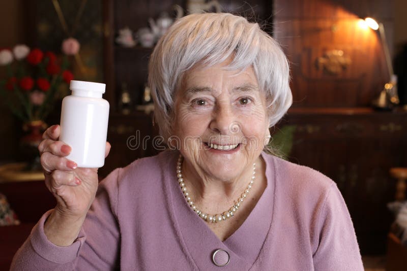 Senior Woman Holding Pills Bottle Stock Image - Image of medical ...