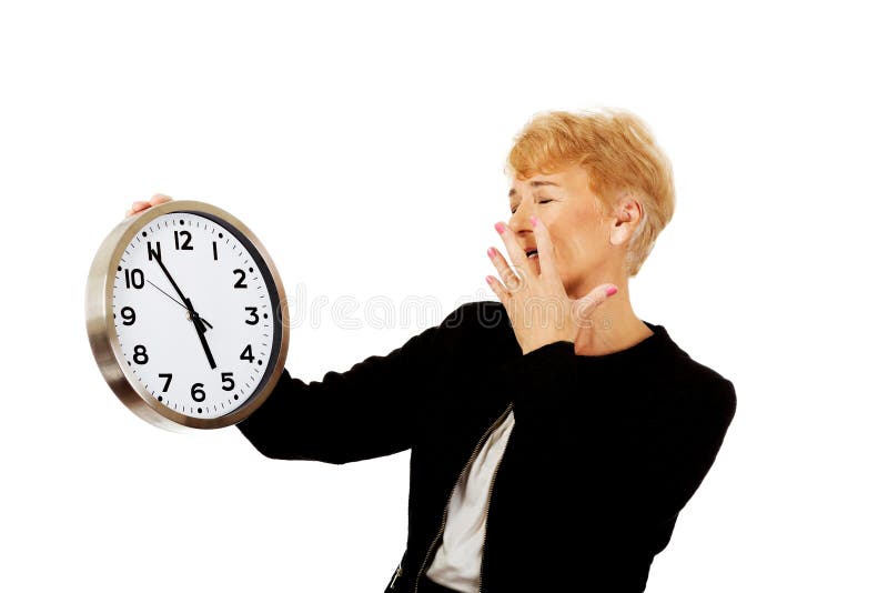 Senior Woman Looking at the Clock in Despair Stock Photo - Image of ...