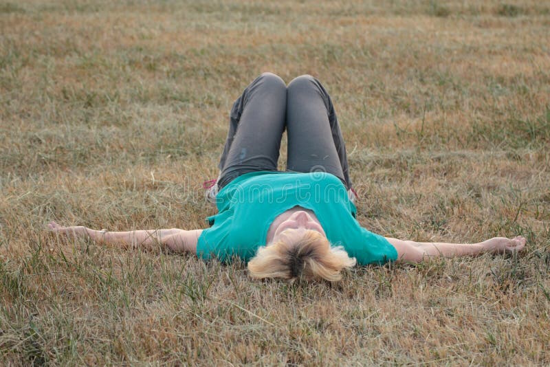 Senior Woman Lying Back Outside Stock Photos - Free & Royalty-Free ...