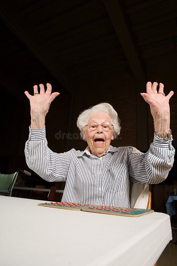 Senior woman playing bingo stock image. Image of enjoy - 62809231