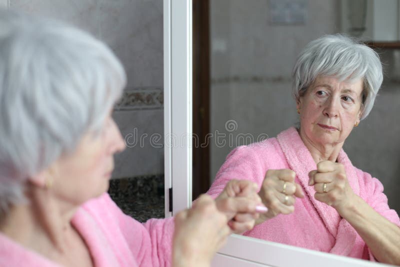 Senior Woman Ready To Fight Her Mirror Reflection Stock Image - Image ...