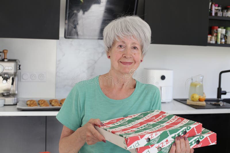 Senior Woman Receiving Pizza Delivery Stock Image - Image of sixties ...