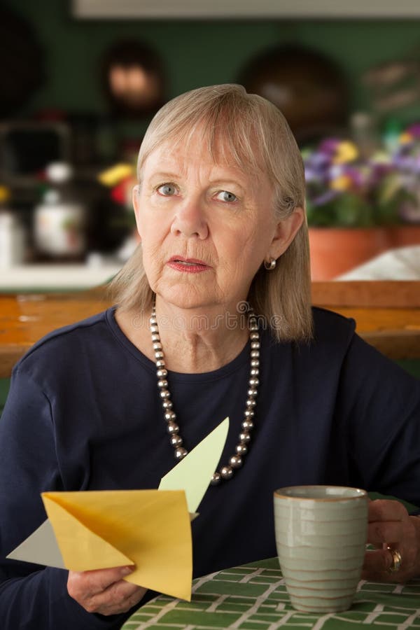 Senior Woman with Sympathy Card Stock Photo - Image of face, loss: 16708926