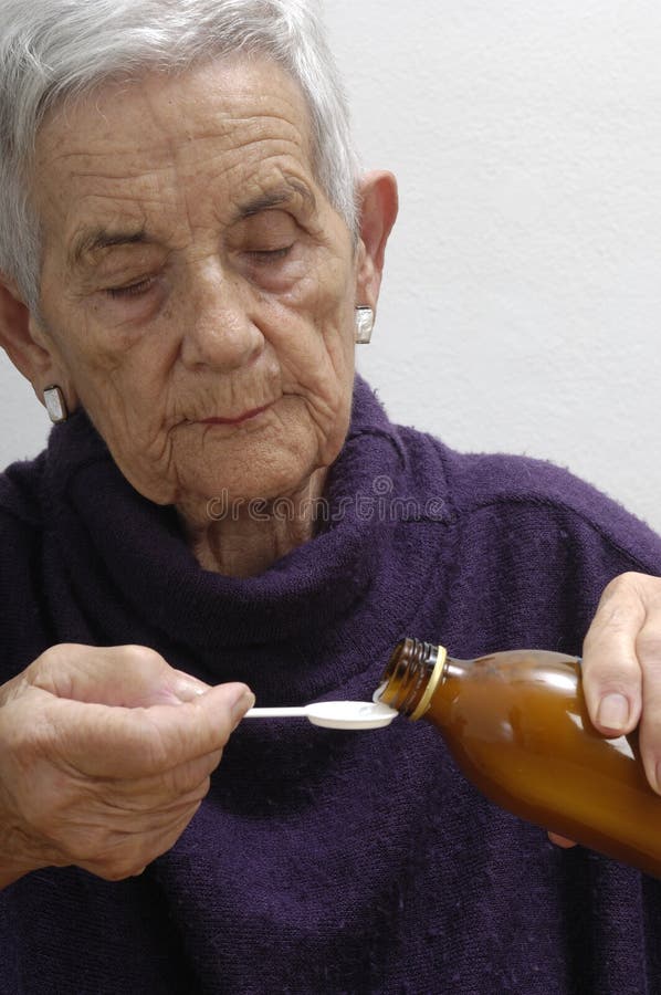 Old woman taking syrup stock image. Image of lady, nature - 176038297