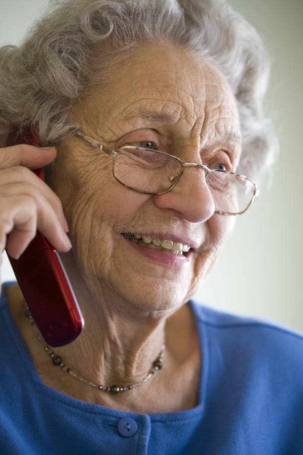 Senior Woman Using Cell Phone Stock Photo - Image of connection ...