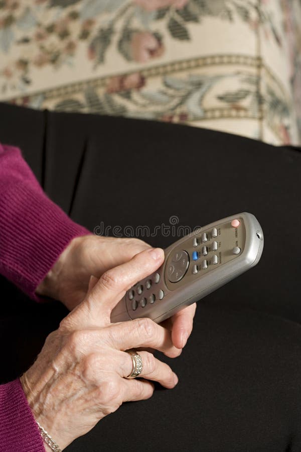 Senior Woman Using Remote Control Stock Image - Image of human, face ...