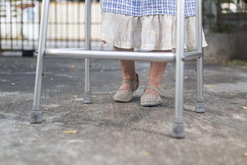 Senior Woman Using a Walker Stock Image - Image of aged, health: 65399599