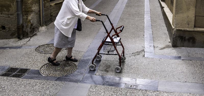 Senior woman with walker stock image. Image of home - 254639481