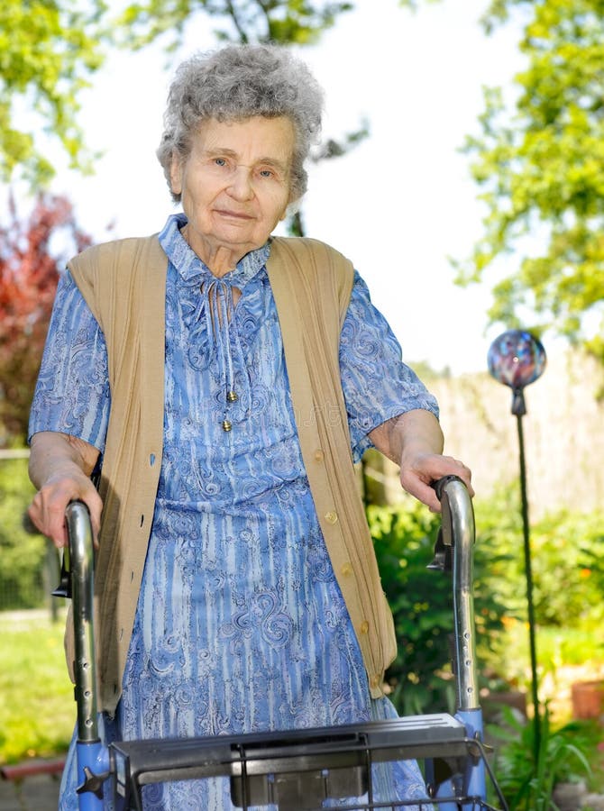 Elderly woman with walker stock photo. Image of aged, lane - 8962694