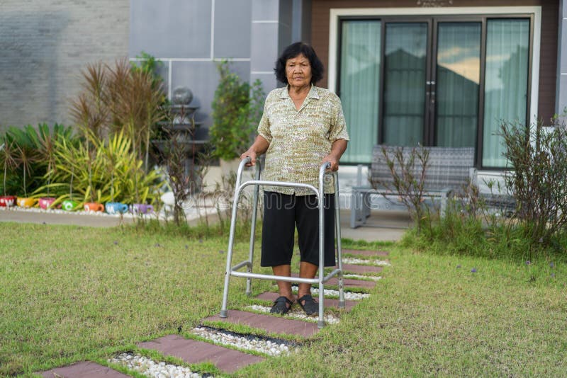 Senior Woman Walking with Walker Stock Image - Image of disabled ...