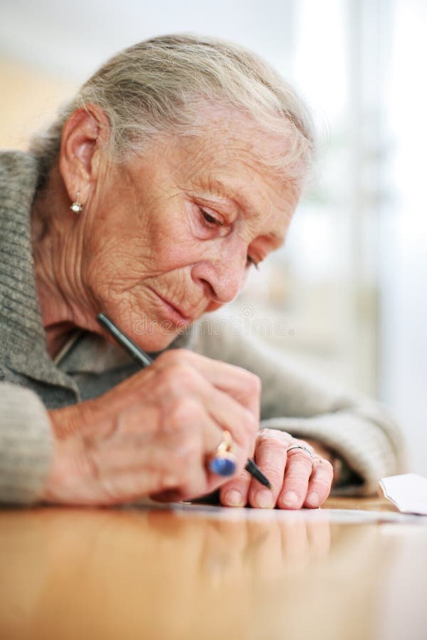Senior Woman Writing a Letter with Pen and Paper Stock Photo - Image of ...