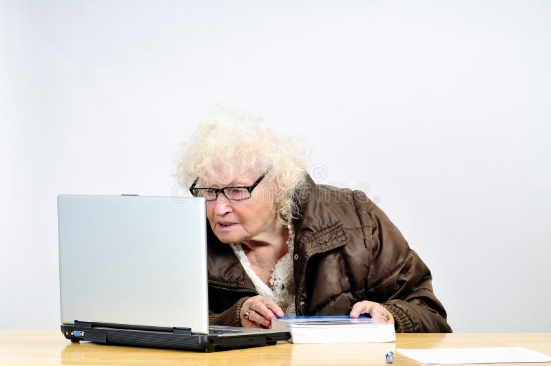 Senior woman with computer stock photo. Image of people - 11662860