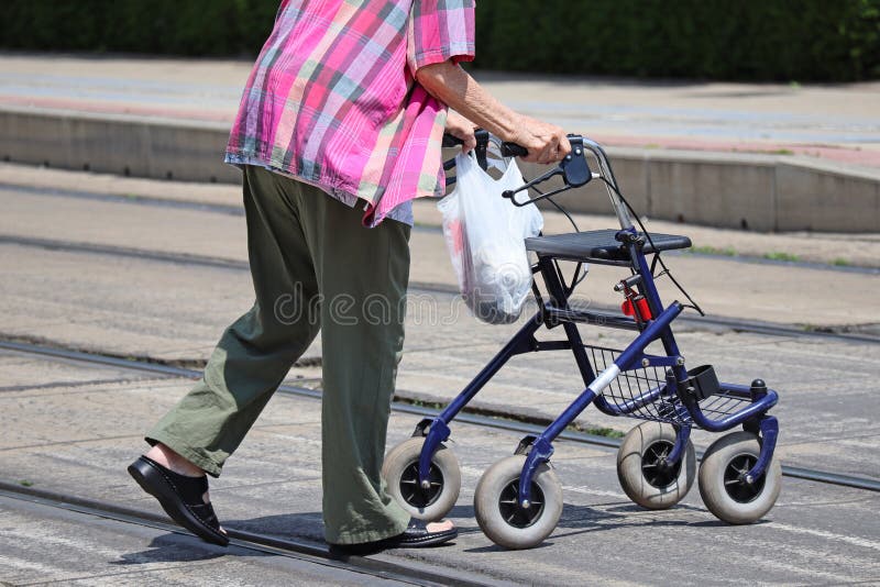 Senior Women on the Street with a Walker Stock Image - Image of green ...