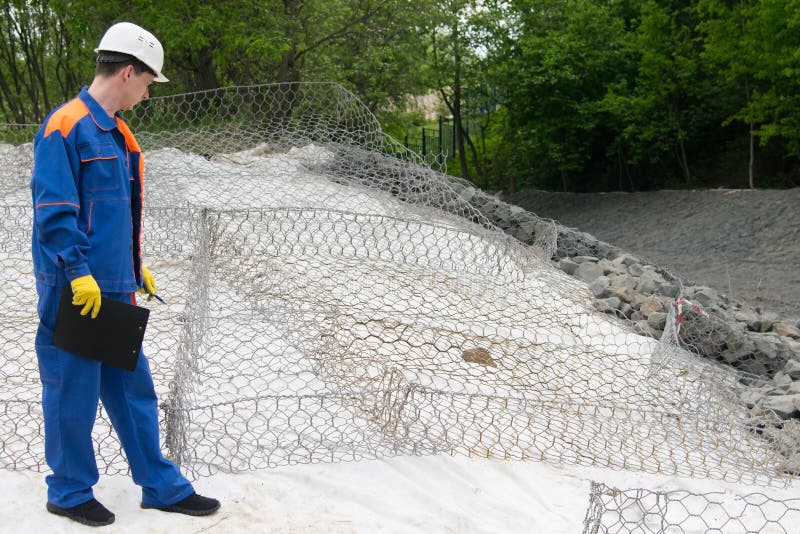 Senior Worker Checks the Correctness of the Intermediate Work, before ...