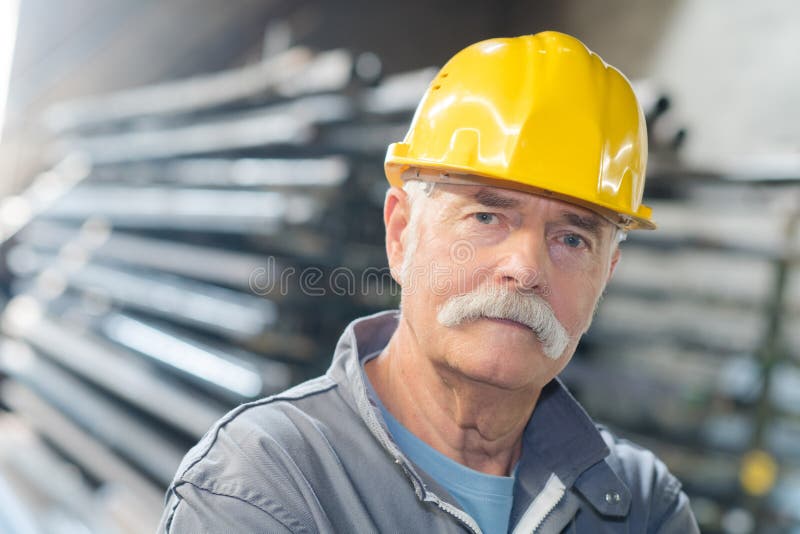 Senior worker at factory stock photo. Image of professional - 103744782