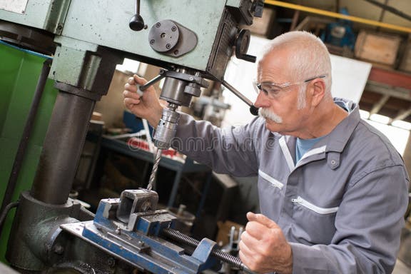Senior Worker Using Bench Drill Stock Image - Image of lever ...
