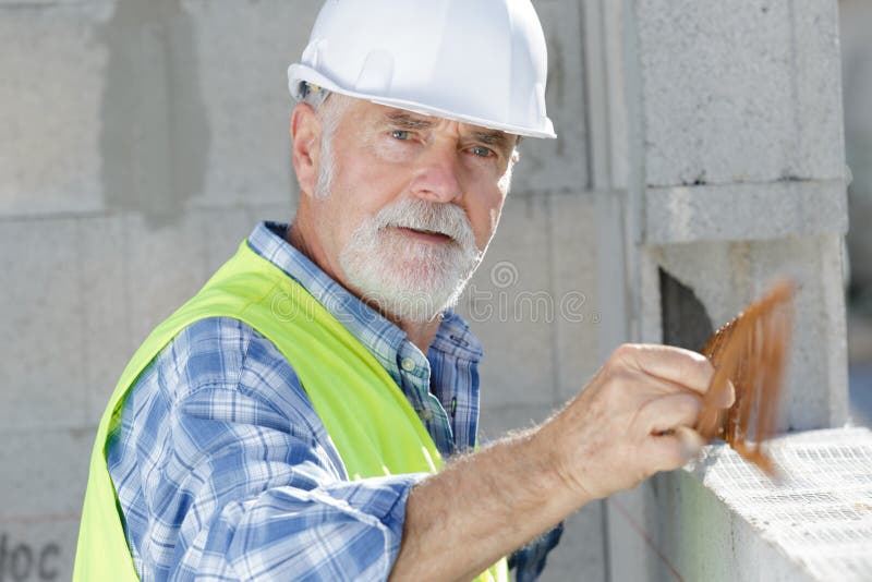Senior Working at Construction Site Stock Image - Image of helicopter ...