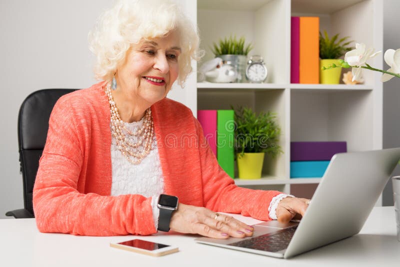 Working Grandma at the Office Sitting by the Computer Stock Image ...