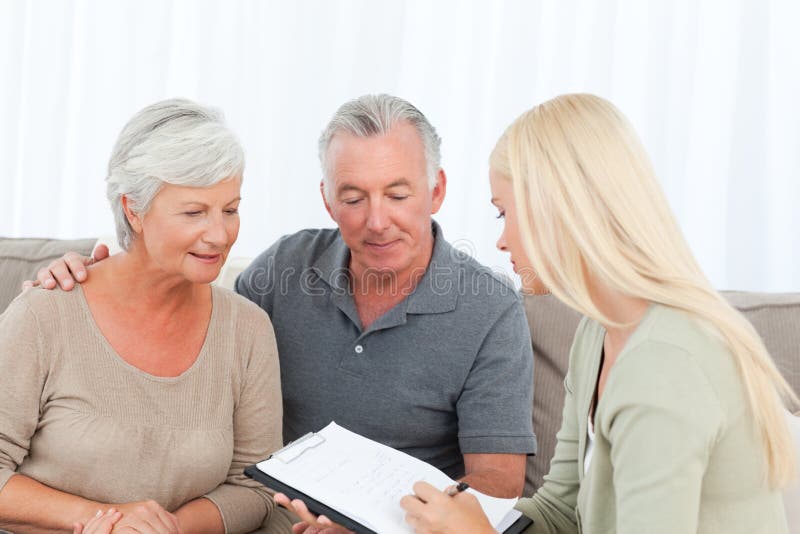 Seniors with Doctor at Home Stock Image - Image of finance, husband ...
