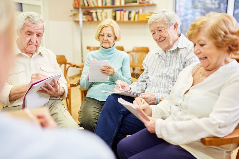 Seniors in Group Therapy while Writing Stock Photo - Image of doctor ...