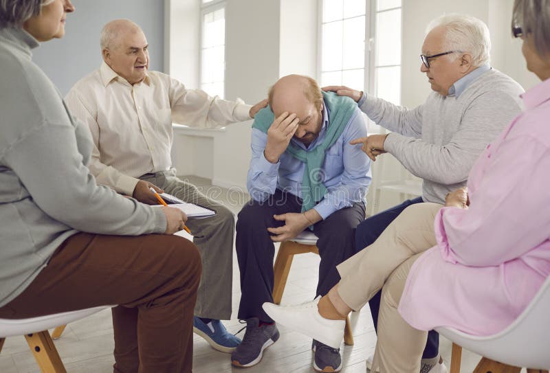 Group of Friendly Seniors People Supporting Elderly Man on a Therapy ...