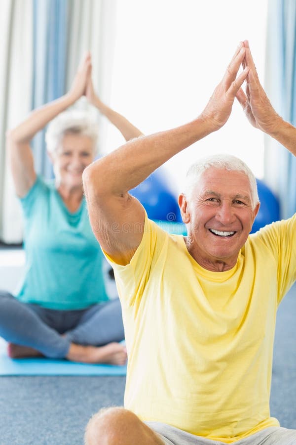 Seniors Performing Yoga in a Studio Stock Photo - Image of active ...