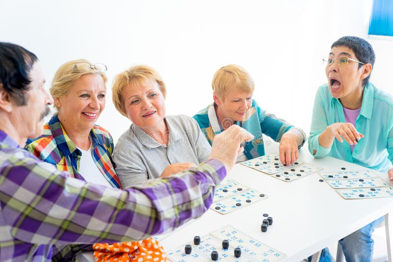 Seniors playing bingo stock photo. Image of people, hand - 102171880