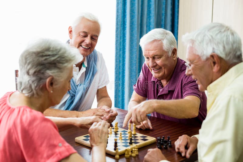 Seniors playing chess stock photo. Image of friend, aged - 77687140
